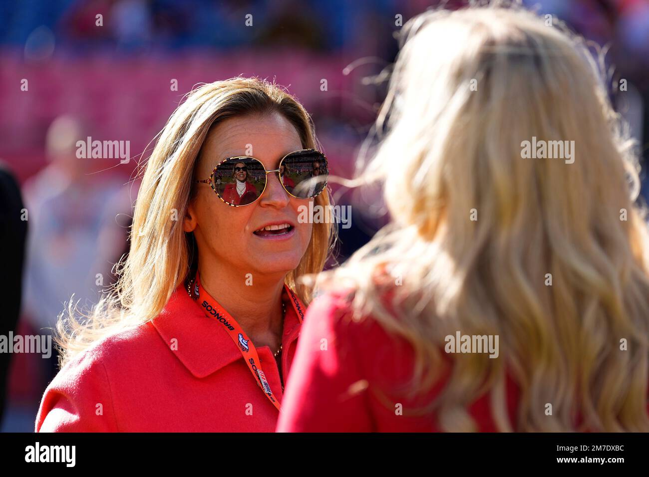 Denver Broncos owner Carrie Penner talks with Gracie Hunt, daughter of ...