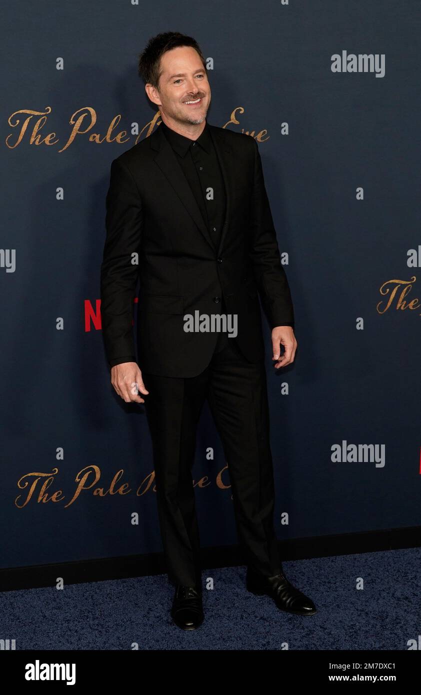 Scott Cooper poses at the premiere of the film "The Pale Blue Eye ...