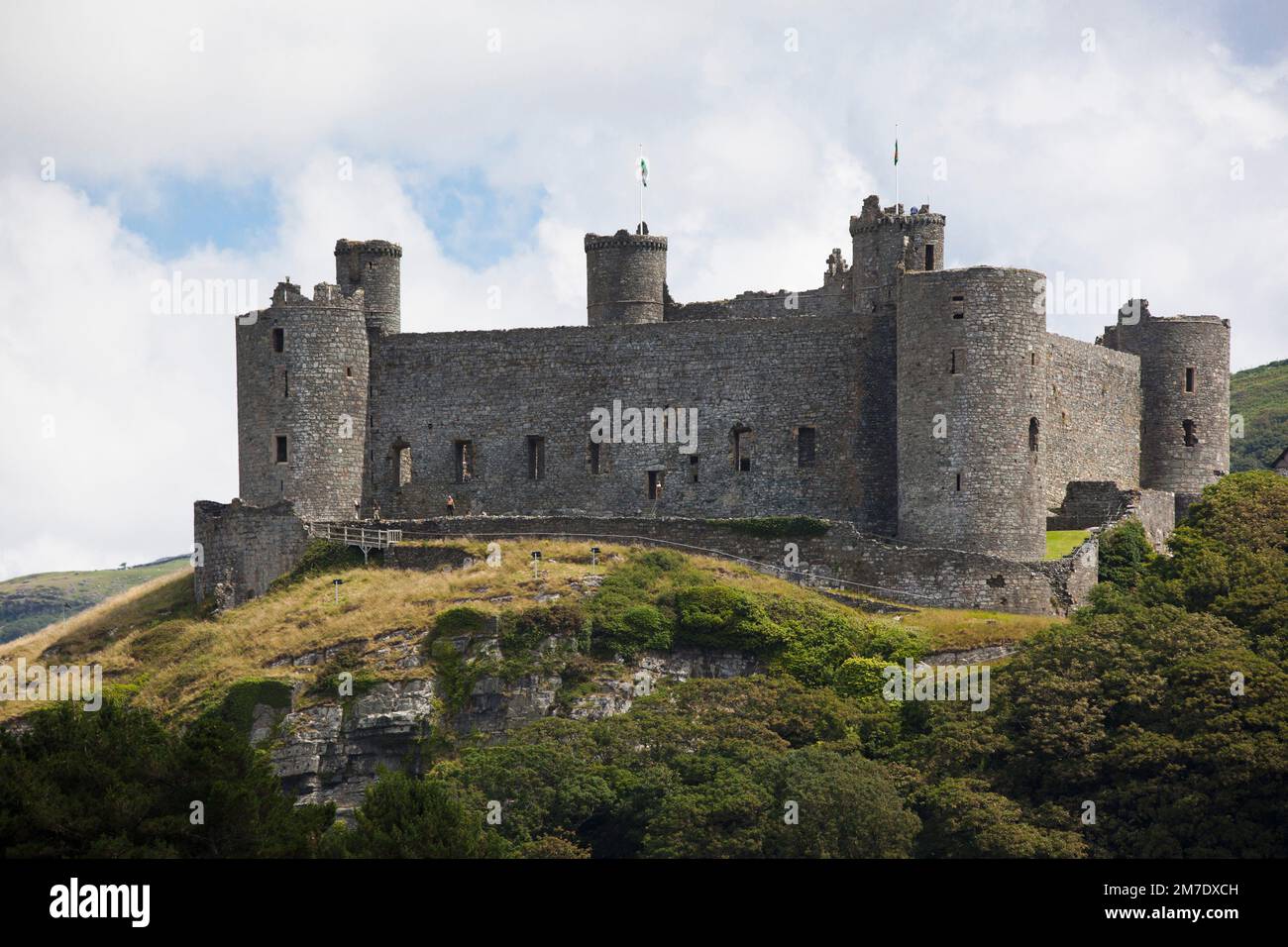 View of Harlech castle in North Wales on the hillside in summer ...