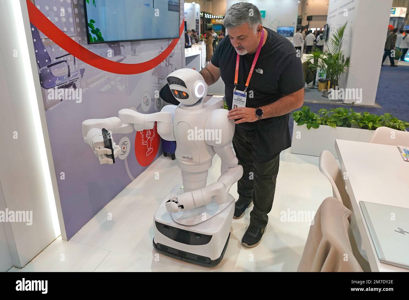 Aeo, a service robot from Aeolus Robotics is shown at the Aeolus booth ...