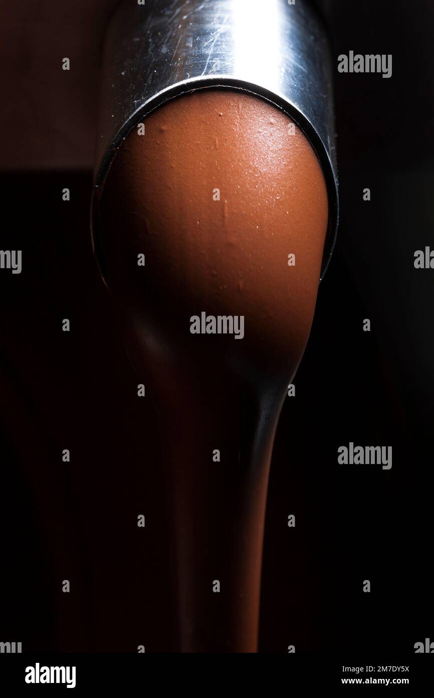 Chocolate factory pouring close up hi-res stock photography and images ...