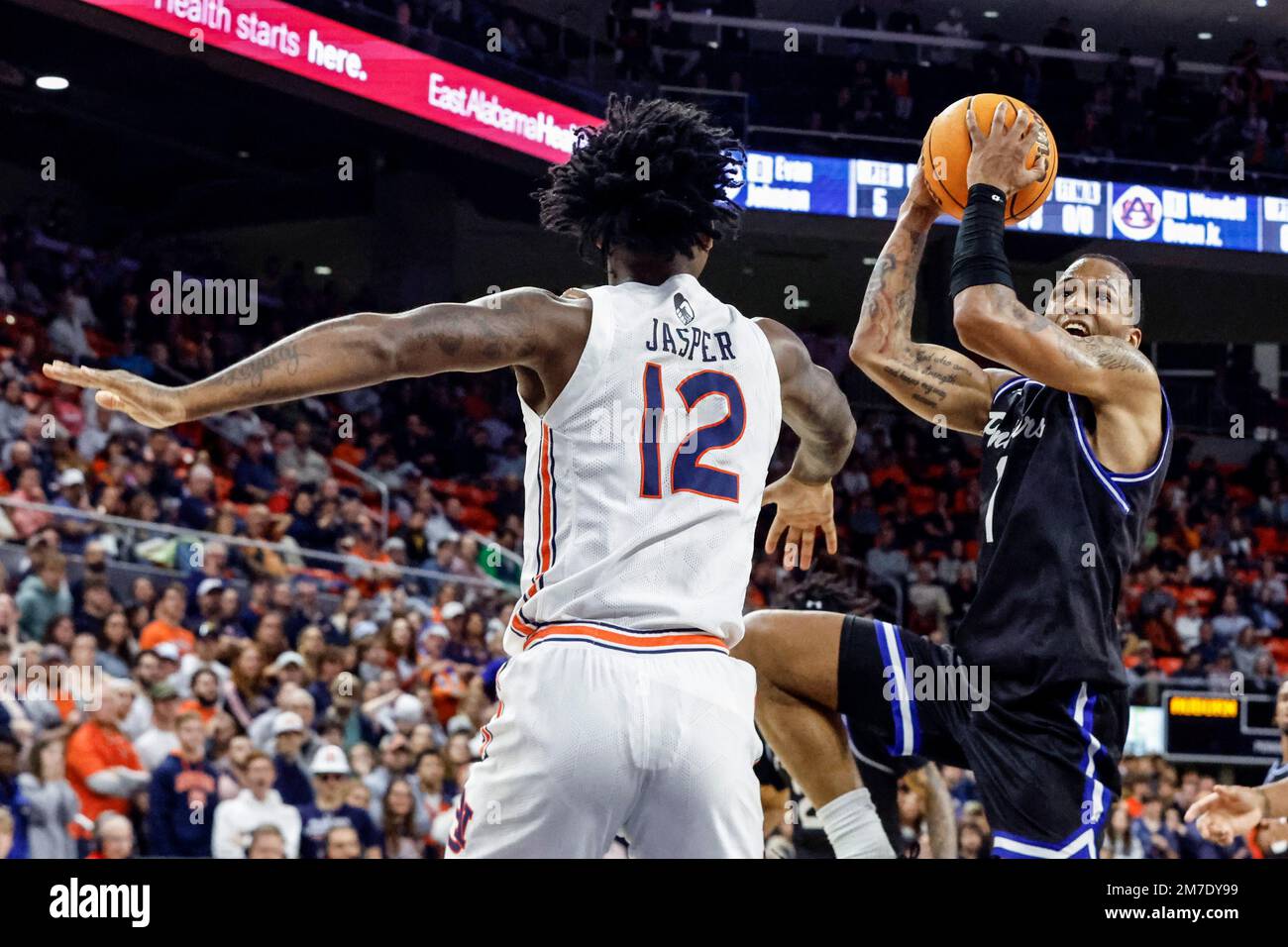 Georgia State guard Dwon Odom (1) shoots over Auburn guard Zep Jasper ...