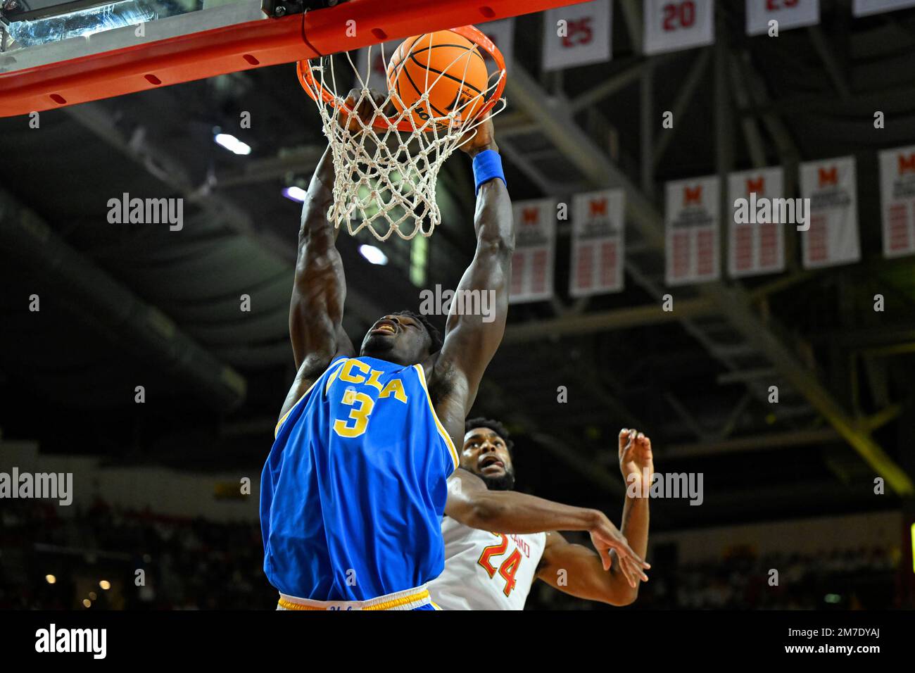 UCLA forward Adem Bona (3) dunks the ball against Maryland forward ...