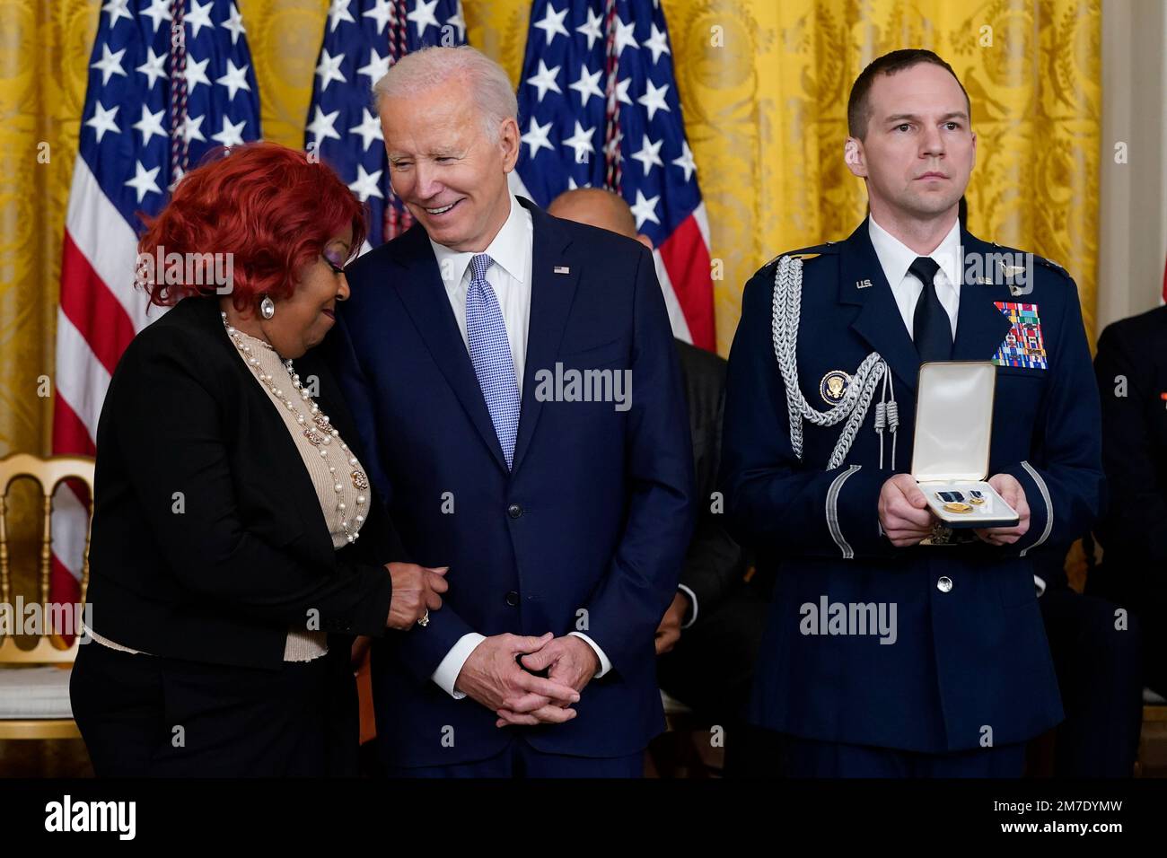 President Joe Biden speaks with Ruby Freeman before awarding her the ...