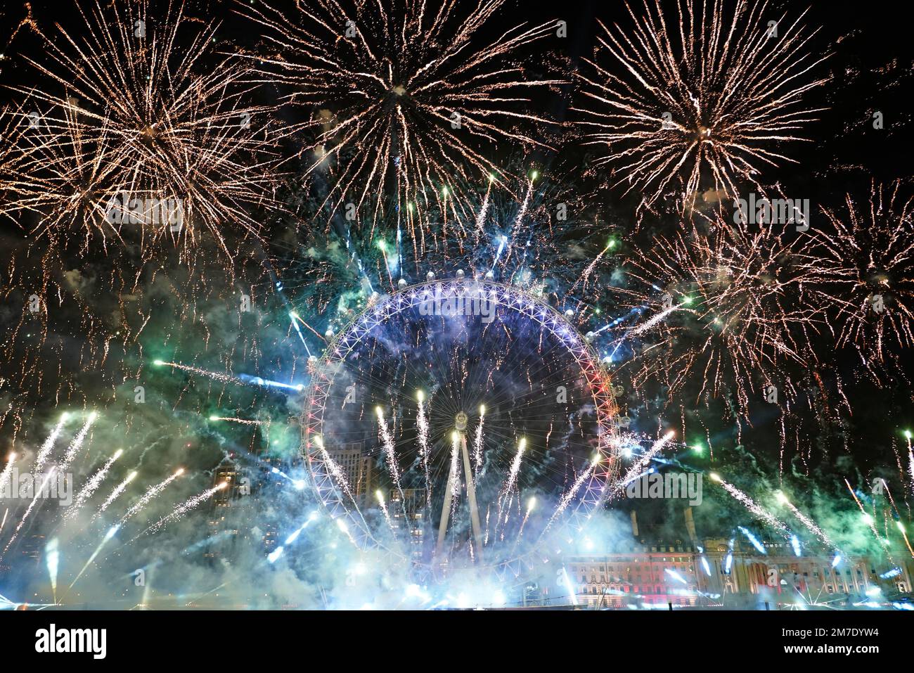 Fireworks light-up the sky over the London Eye in central London to ...