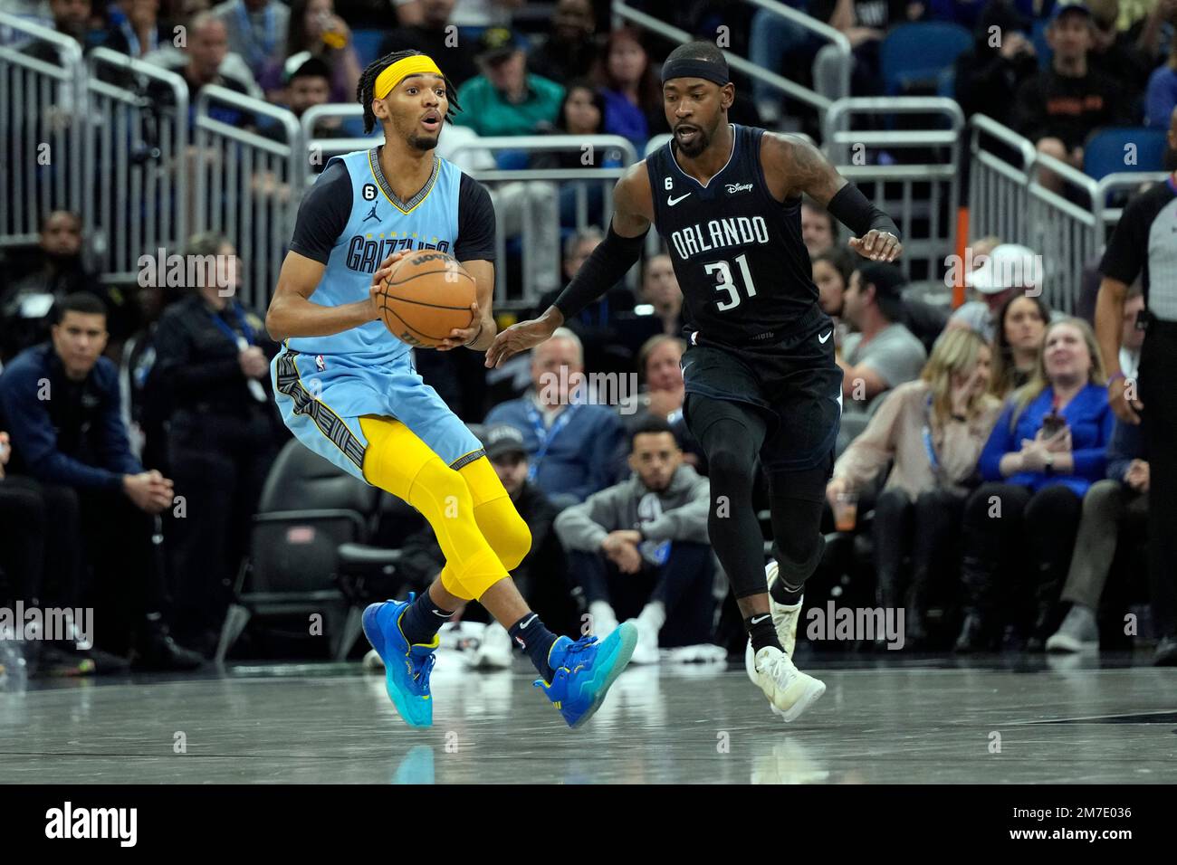 Memphis Grizzlies' Ziaire Williams, let, passes the ball as he is ...