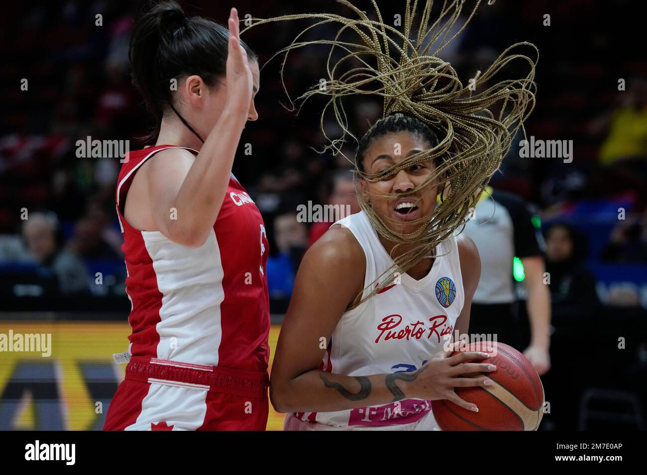 Puerto Rico's Arella Guirantes runs into Canada's Bridget Carleton ...