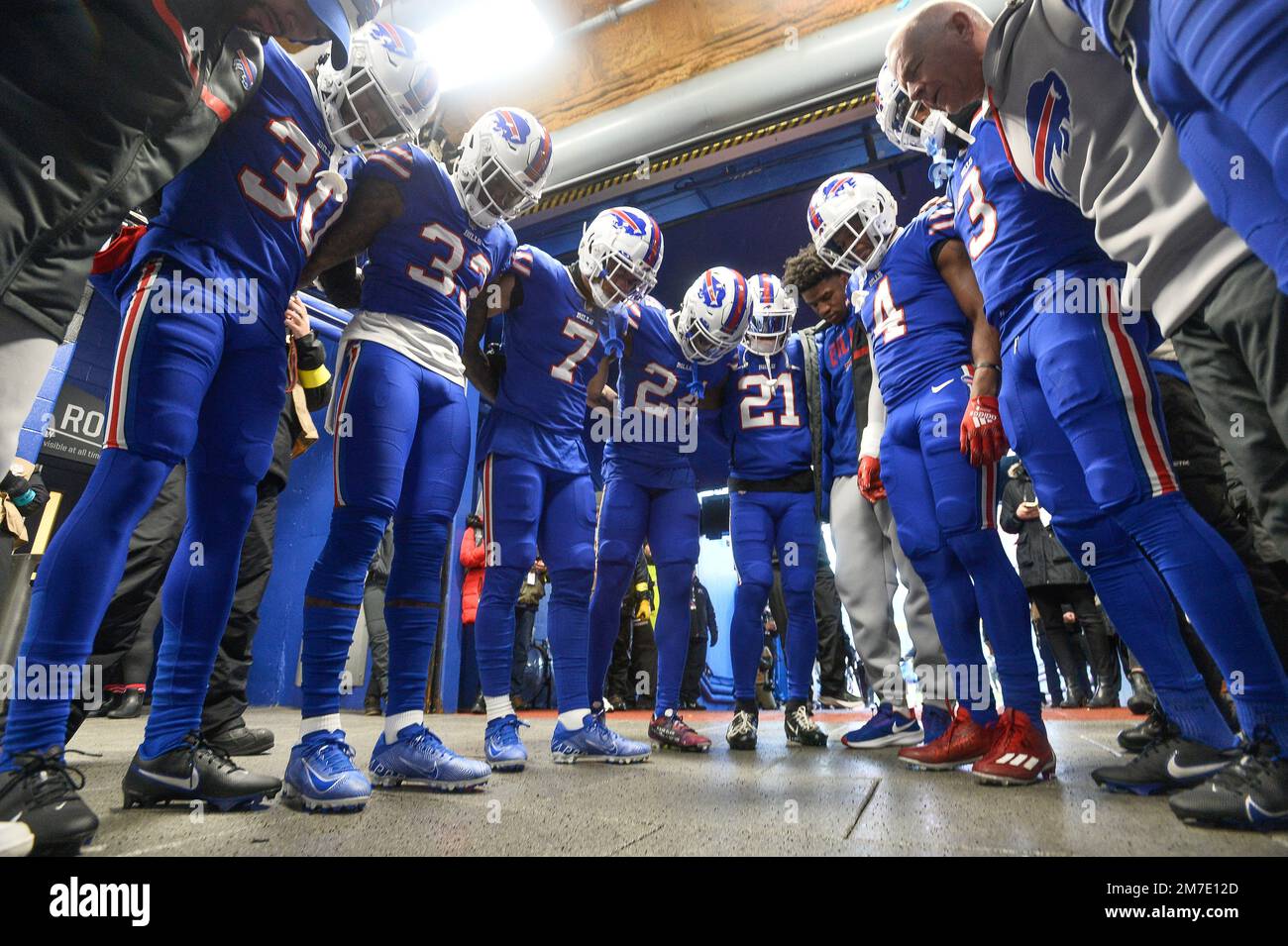 Buffalo Bills defensive players huddle before an NFL football game ...