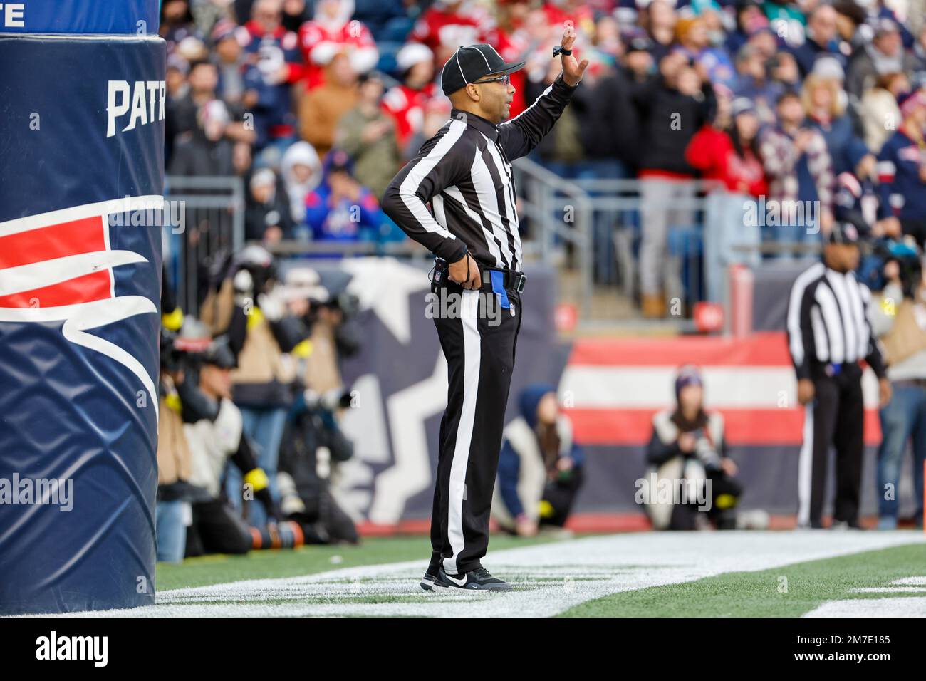 NFL back judge Greg Yette (38) officiates during the first half of an ...