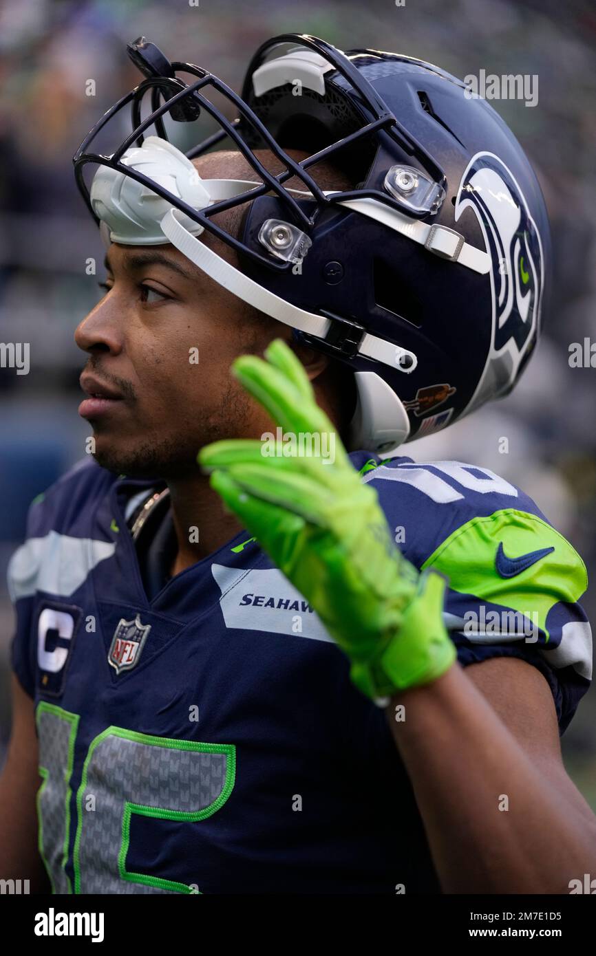 Seattle Seahawks wide receiver Tyler Lockett (16) walks off the field ...