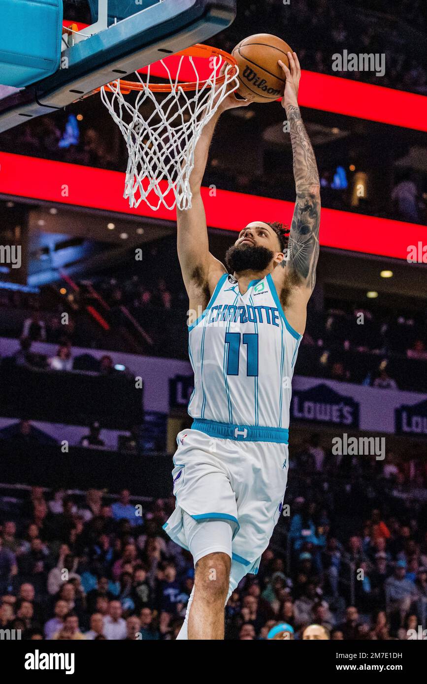 Charlotte Hornets forward Cody Martin (11) goes for a dunk against the ...