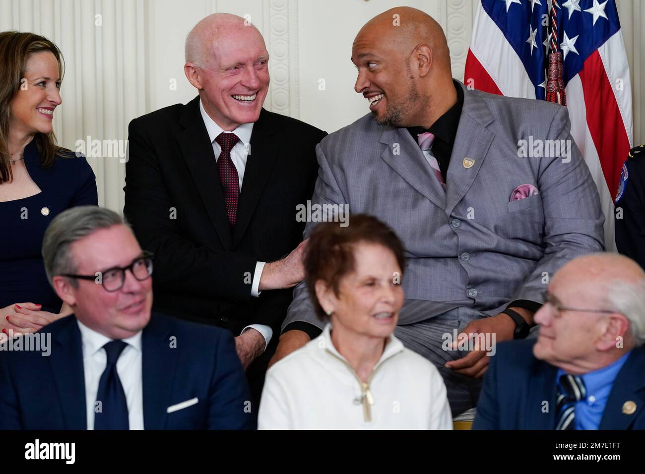 U.S. Capitol Police Sgt. Harry Dunn, top right, and Jocelyn Benson ...