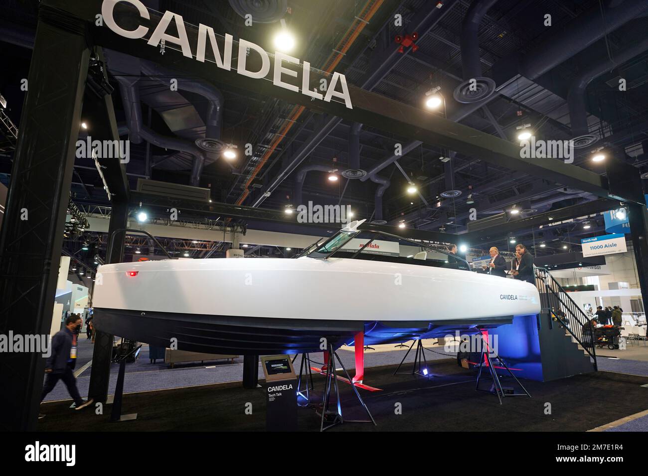 The Candela electric hydrofoiling speedboat is shown at Candela booth ...
