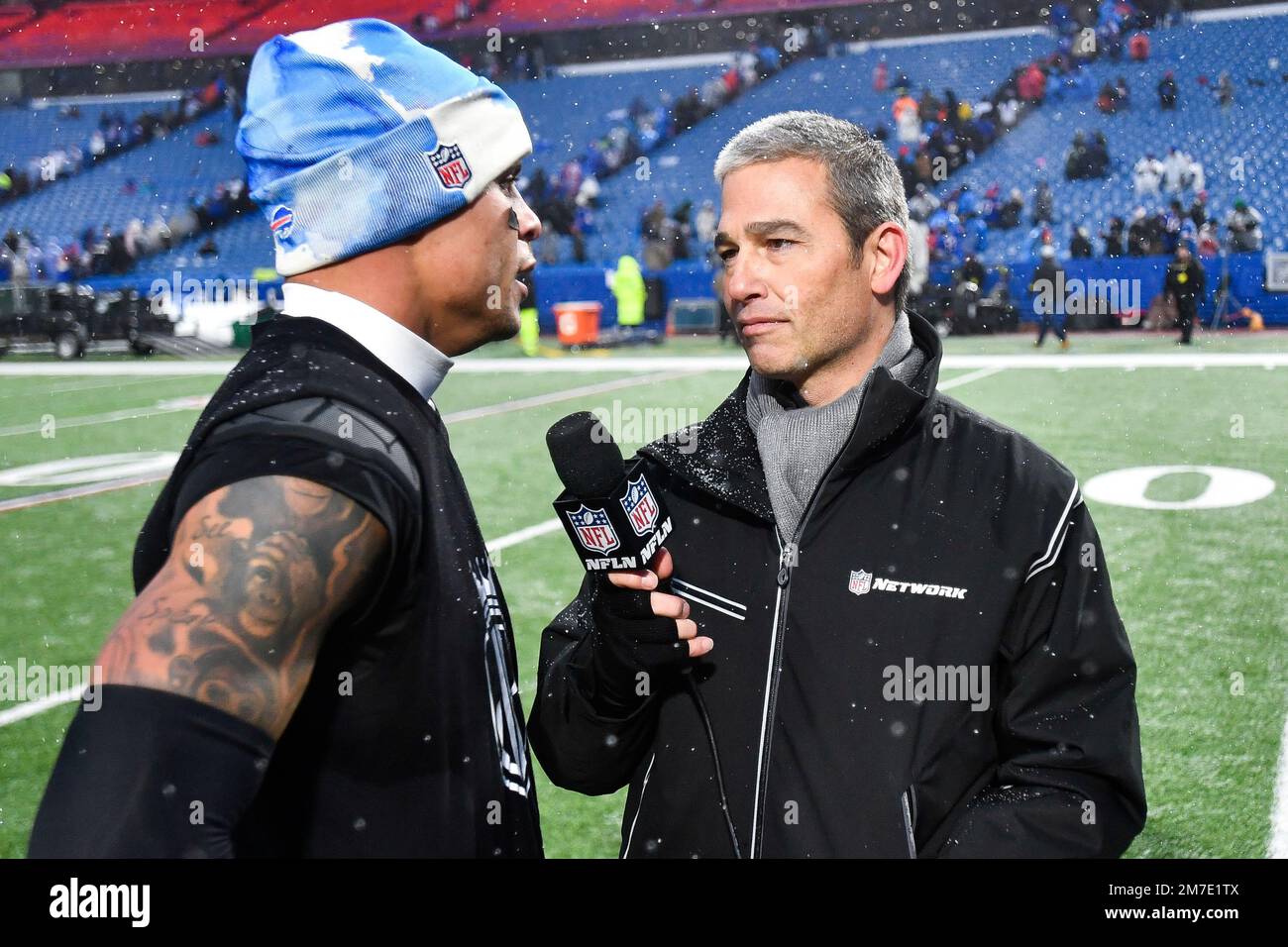 NFL analyst Mike Girardi, right, interviews Buffalo Bills safety Jordan ...