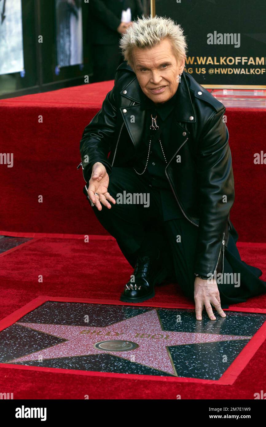 Musician Billy Idol poses with his new star on the Hollywood Walk of ...