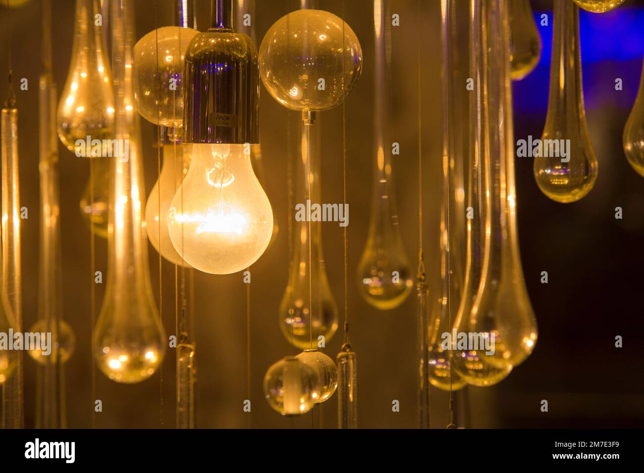 Ornate electrical light fitting with drop hanging decorations Stock ...