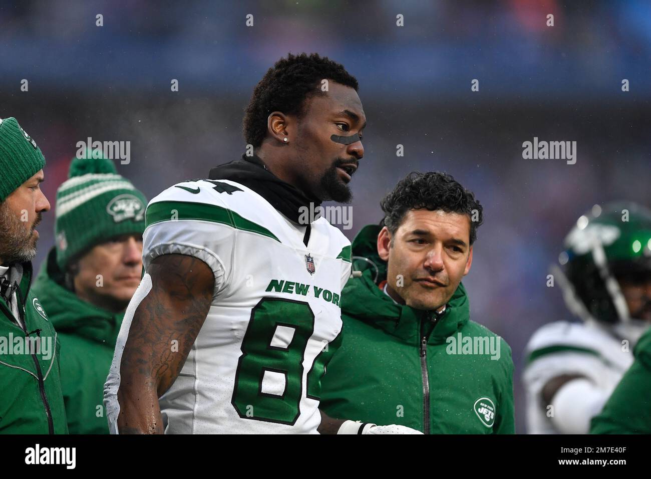 New York Jets wide receiver Corey Davis (84) walks off the field with ...