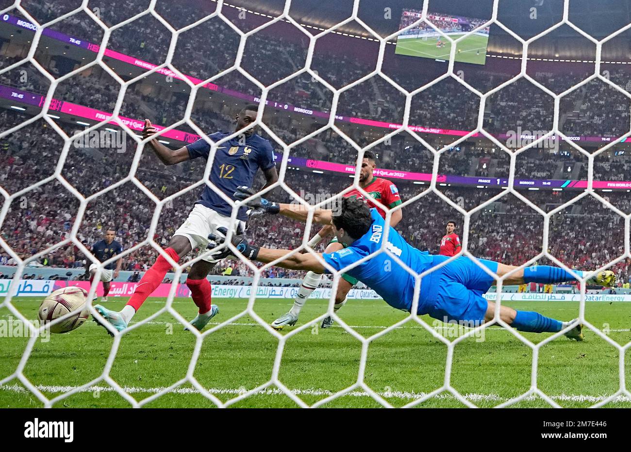 France's Randal Kolo Muani scores his side's second goal past Morocco's ...