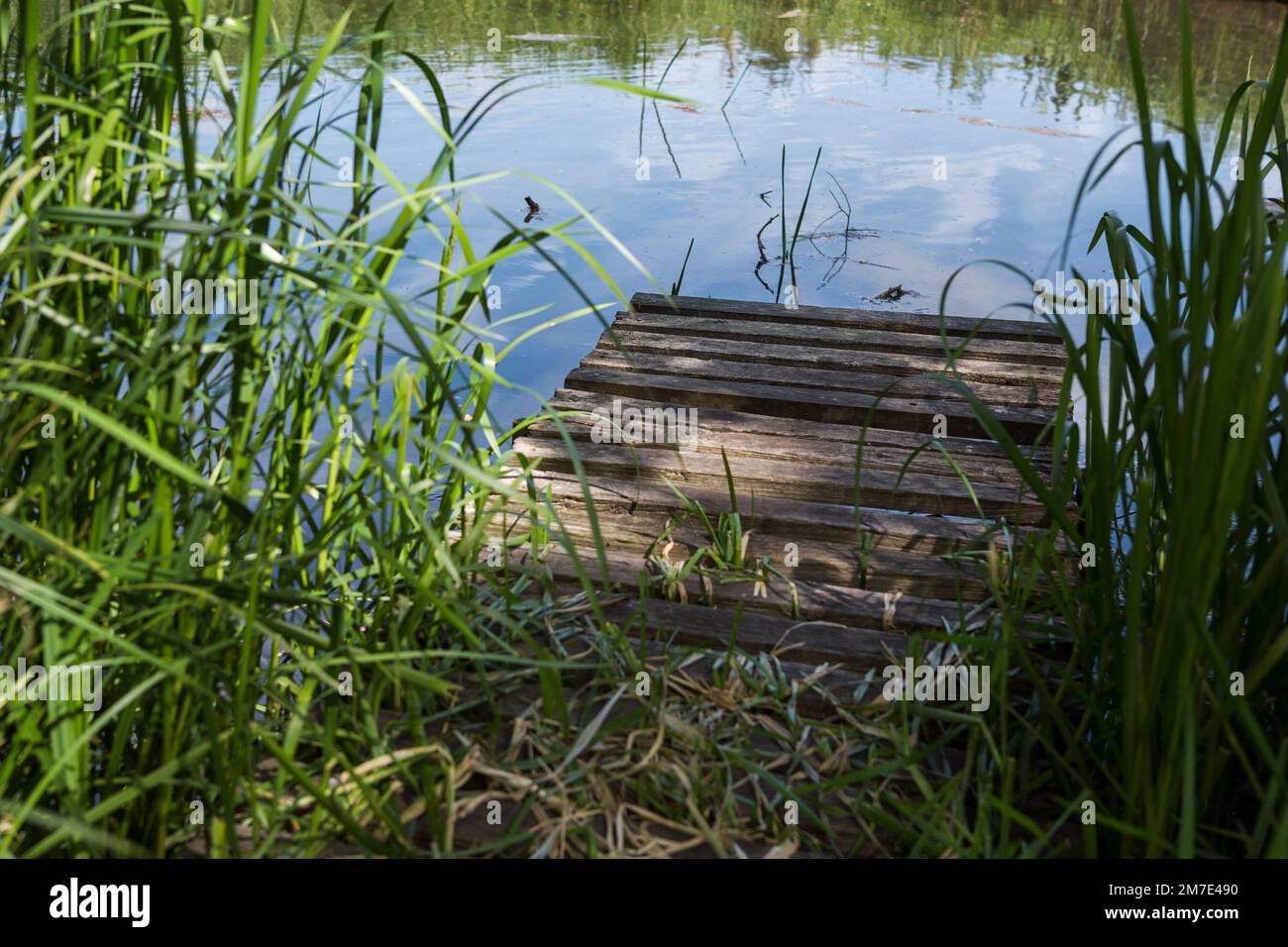 Simple wooden jetty hi-res stock photography and images - Alamy