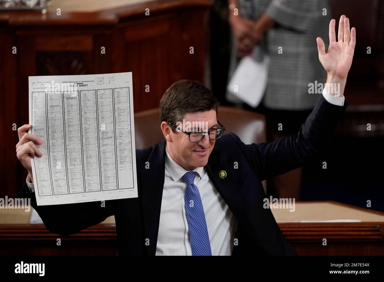 Rep. Bryan Steil, R-Wis., holds up the tally sheet in the House chamber ...