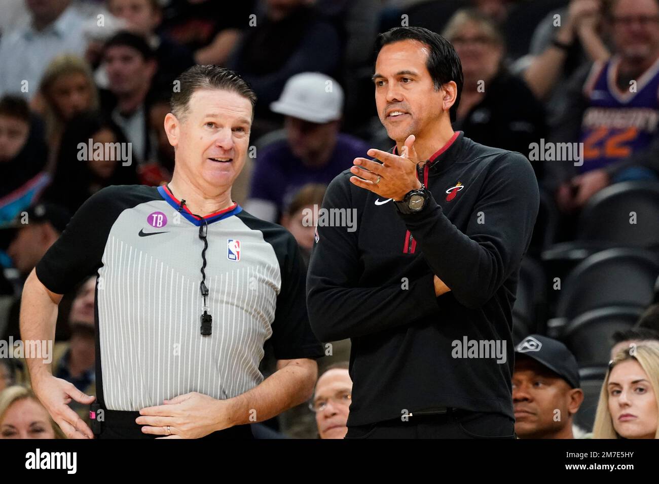 Miami Heat head coach Erik Spoelstra, right, argues with referee Pat Fraher (26) during the ...