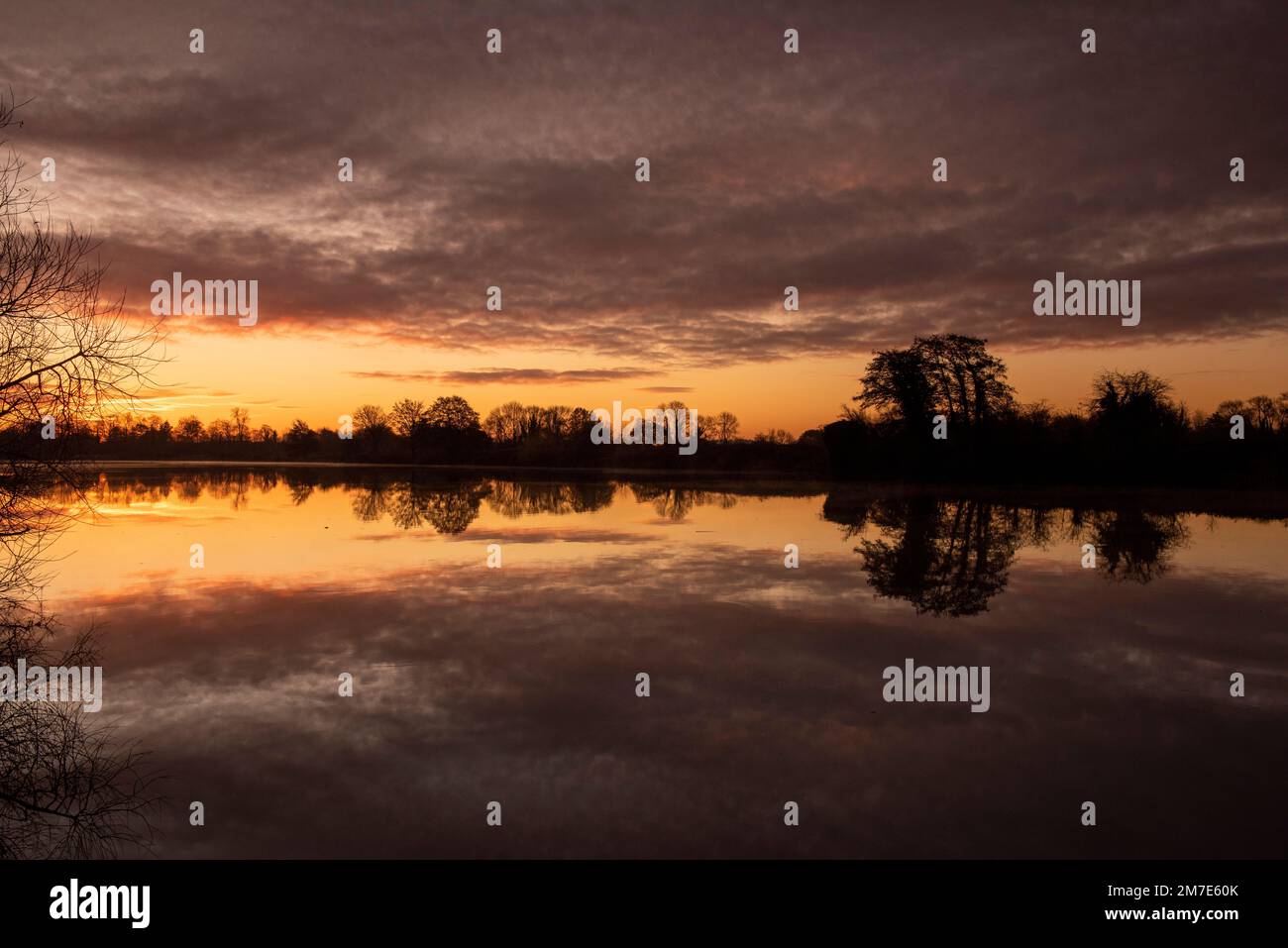 Sunrise reflections on the River Trent at Colwick Park in Nottingham ...