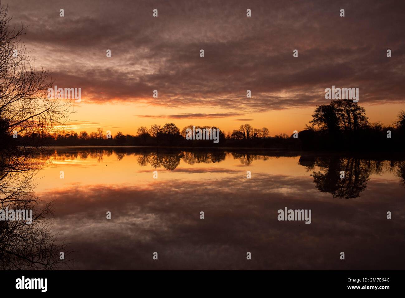 Sunrise reflections on the River Trent at Colwick Park in Nottingham ...