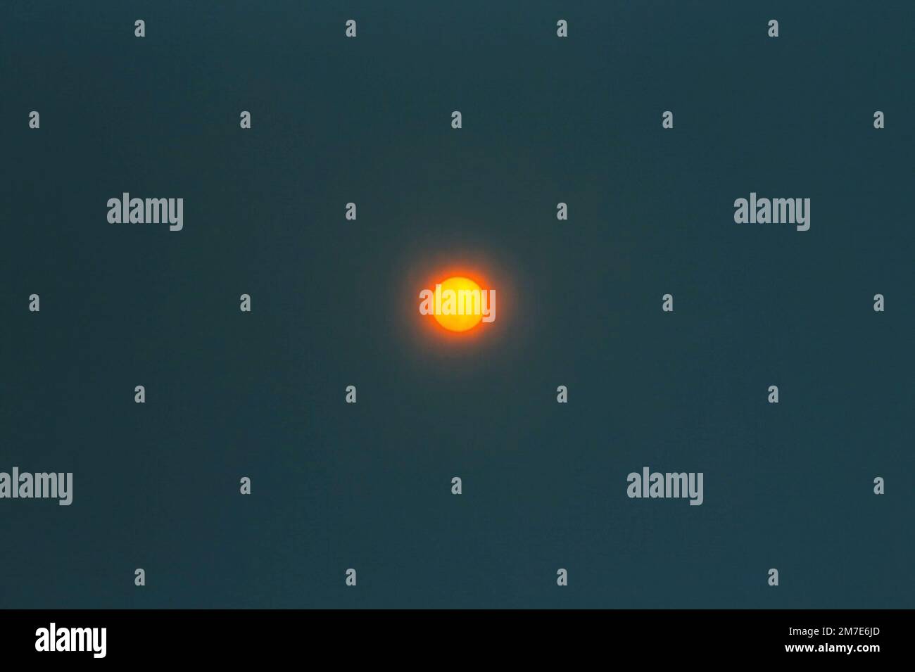 Red sun and sunrise in cirencester during a cloud of sand from the ...