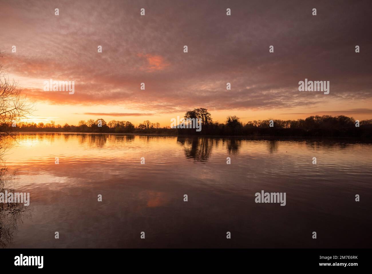 Sunrise reflections on the River Trent at Colwick Park in Nottingham ...