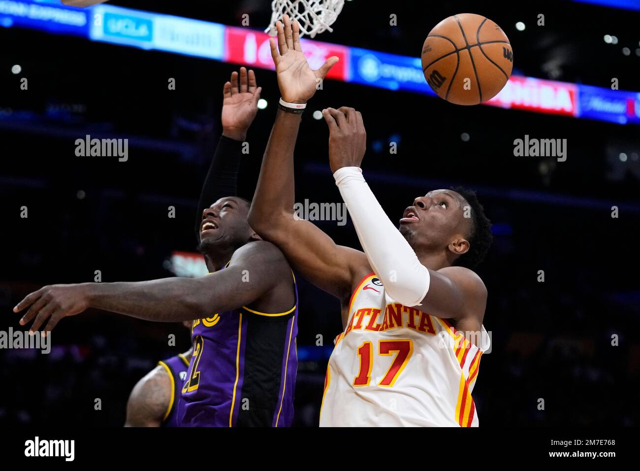 Atlanta Hawks' Onyeka Okongwu (17) looks to grab a rebound against Los ...