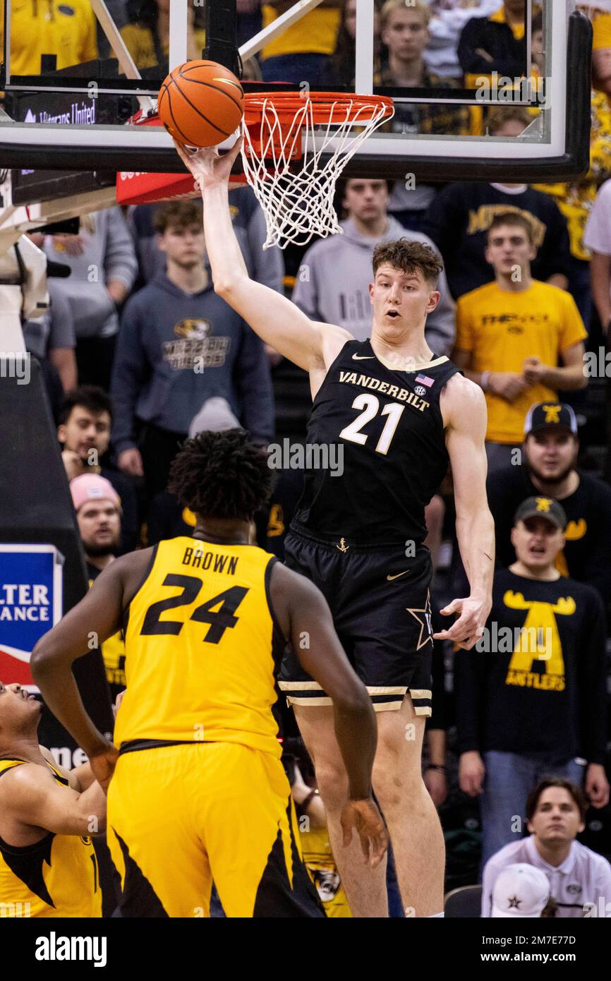 Vanderbilt's Liam Robbins, top, passes the ball over Missouri's Kobe ...