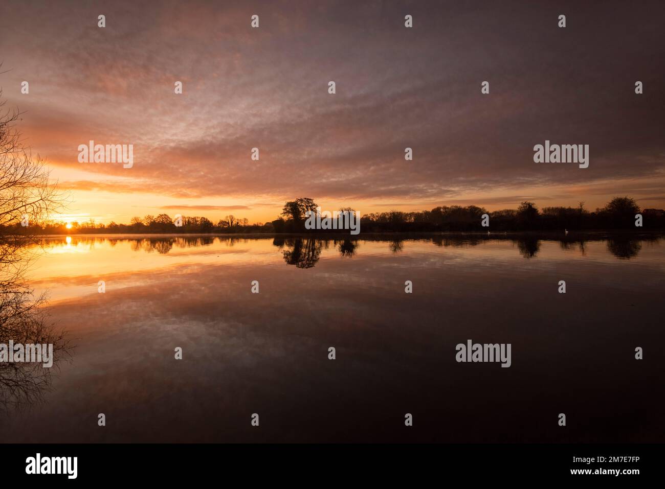 Sunrise reflections on the River Trent at Colwick Park in Nottingham ...