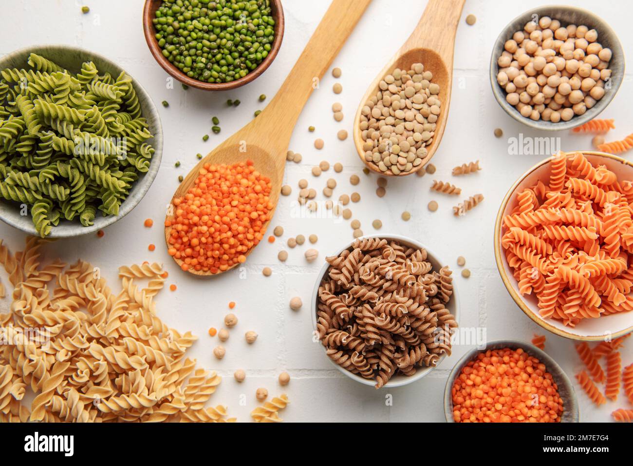 A variety of fusilli pasta made from different types of legumes, green ...