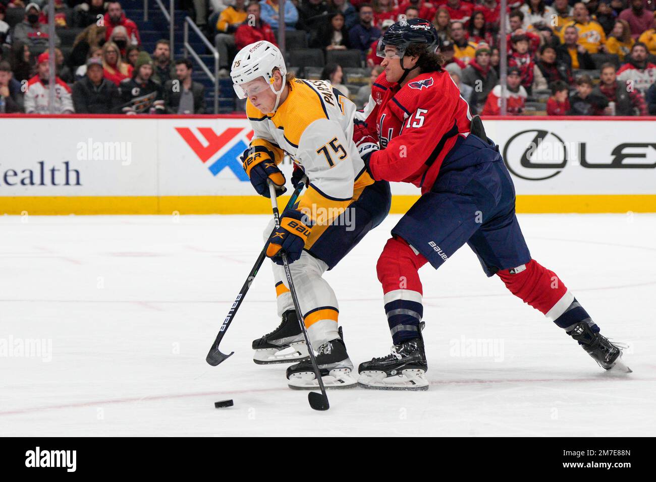 Nashville Predators center Juuso Parssinen (75) tries to shoot as ...