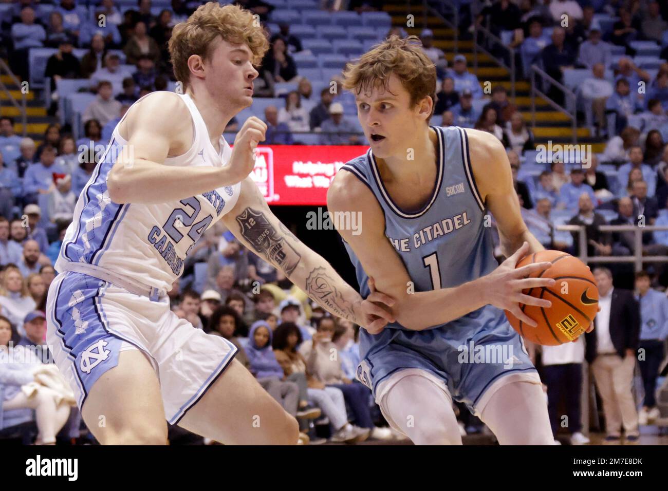 Citadel forward Stephen Clark (1) looks to drive against North Carolina ...