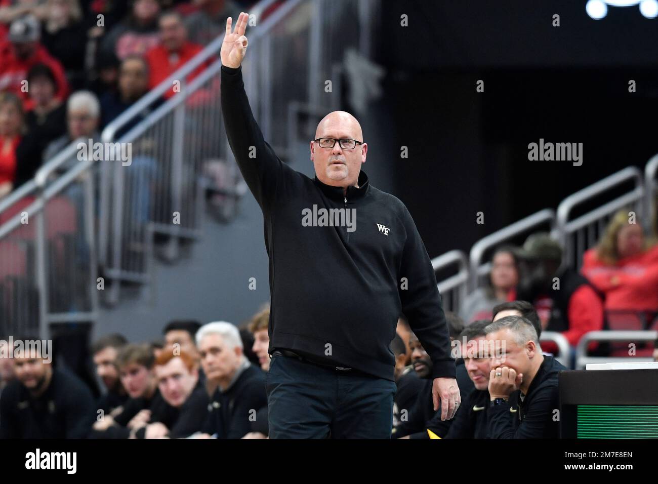 Wake Forest head coach Steve Forbes signals a play in to his team ...