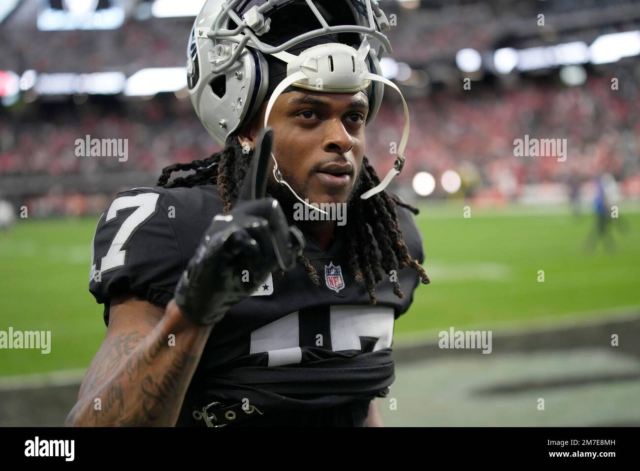 Las Vegas Raiders wide receiver Davante Adams warms up before the start ...