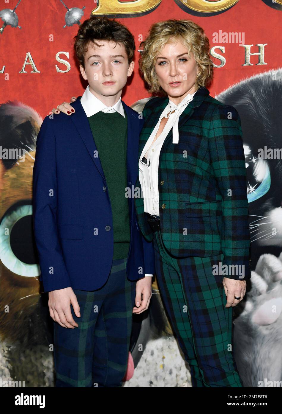 Amy Carlson, right, and son Nigel Butler attend the premiere of "Puss ...