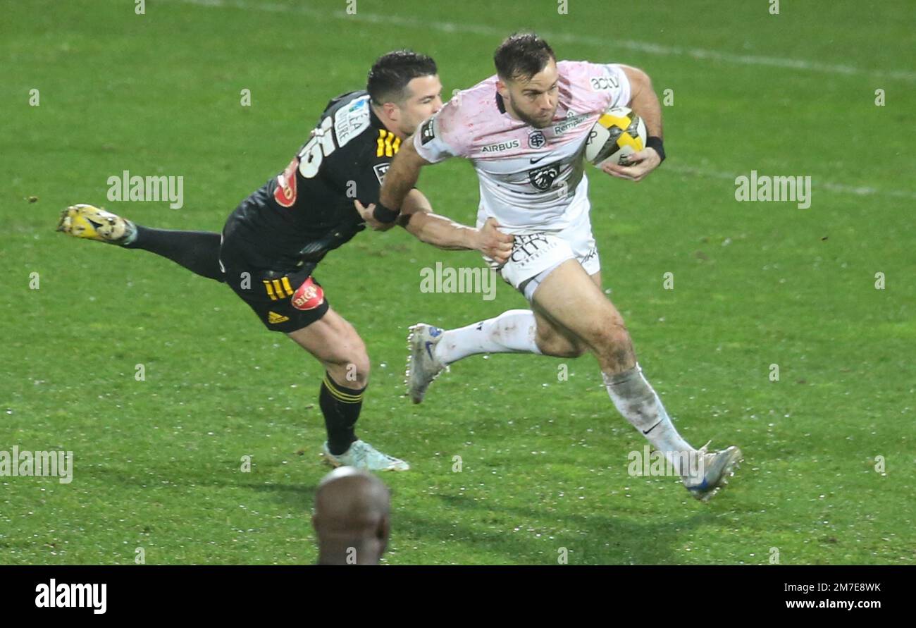 Paul Graou of Stade Toulousain and Brice Dulin of Stade Rochelais ...