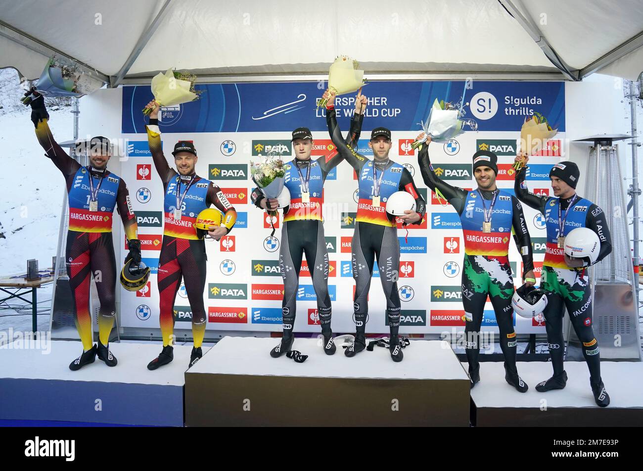 From left, second placed Tobias Wendl and Tobias Arlt of Germany, first ...