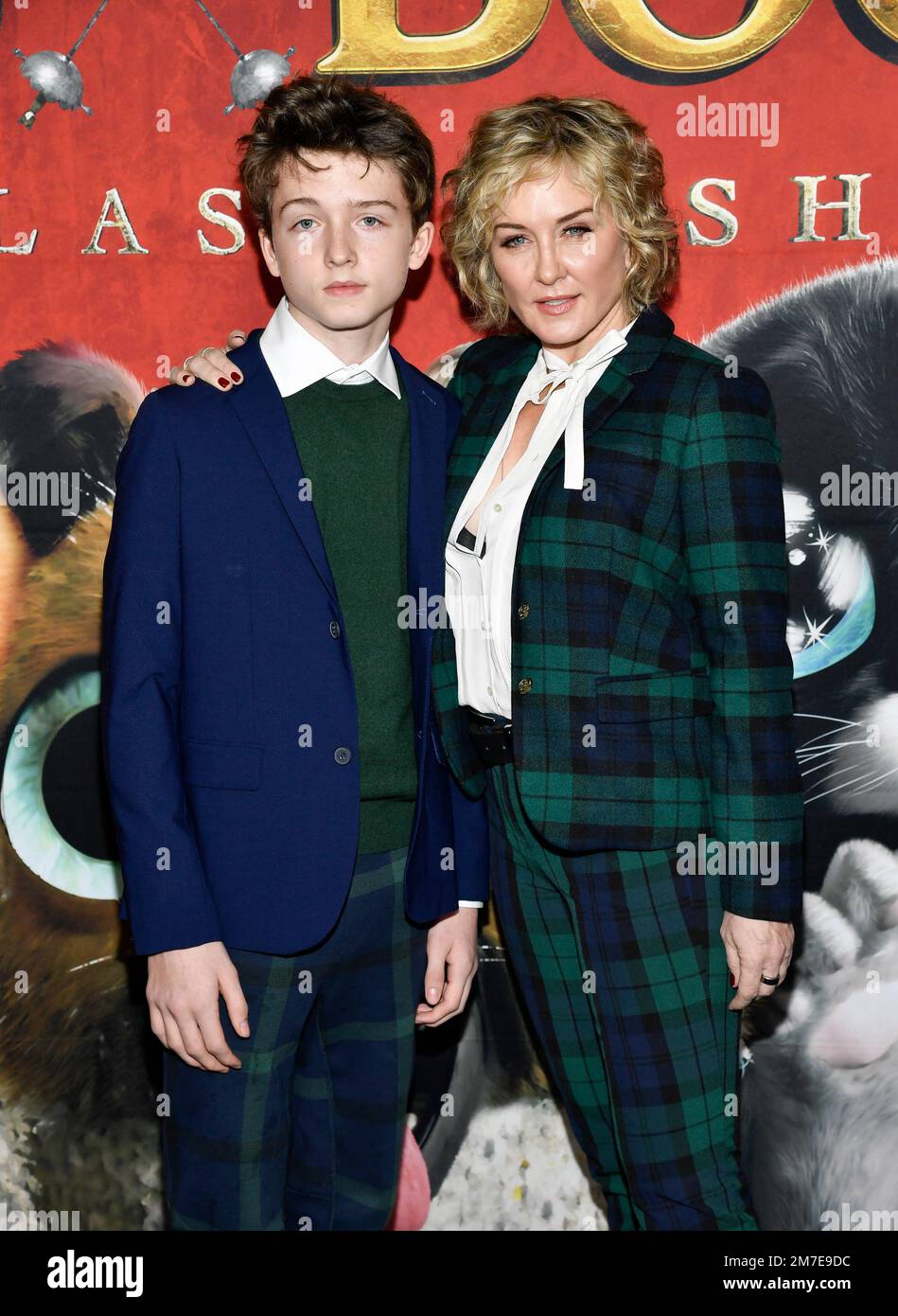 Amy Carlson, right, and son Nigel Butler attend the premiere of "Puss ...