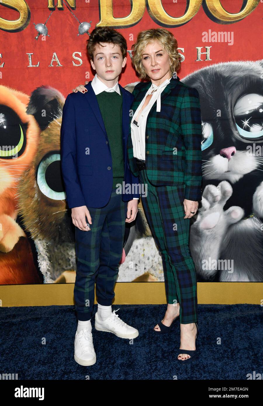 Amy Carlson, right, and son Nigel Butler attend the premiere of "Puss ...