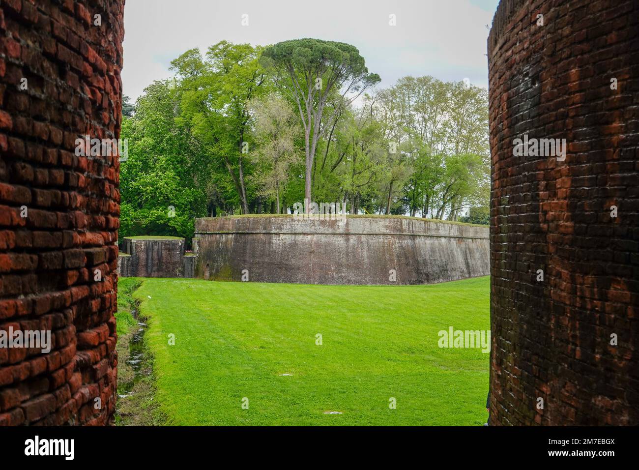 Looking across green space, through the thick Renaissance wall, towards ...