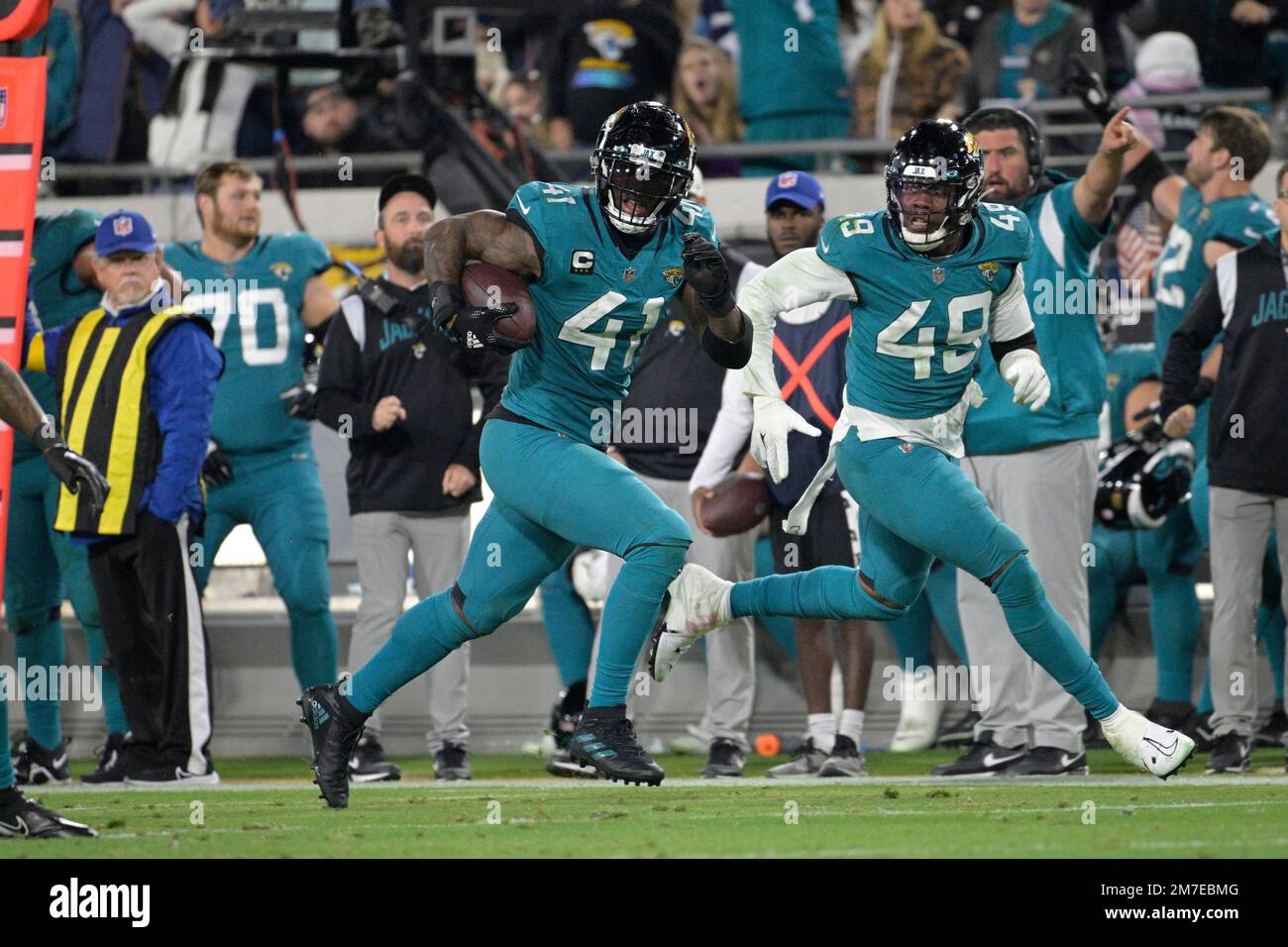 Jacksonville Jaguars linebacker Josh Allen (41) returns a fumble for a ...
