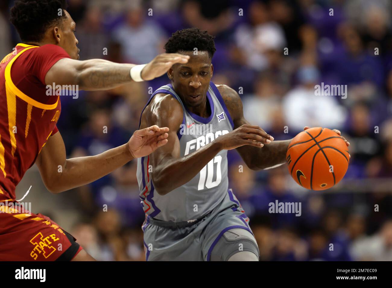 TCU guard Damion Baugh (10) handles the ball as Iowa State center Osun ...