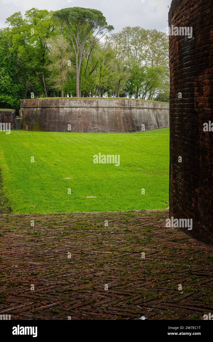 Looking across green space, through the thick Renaissance wall, towards ...