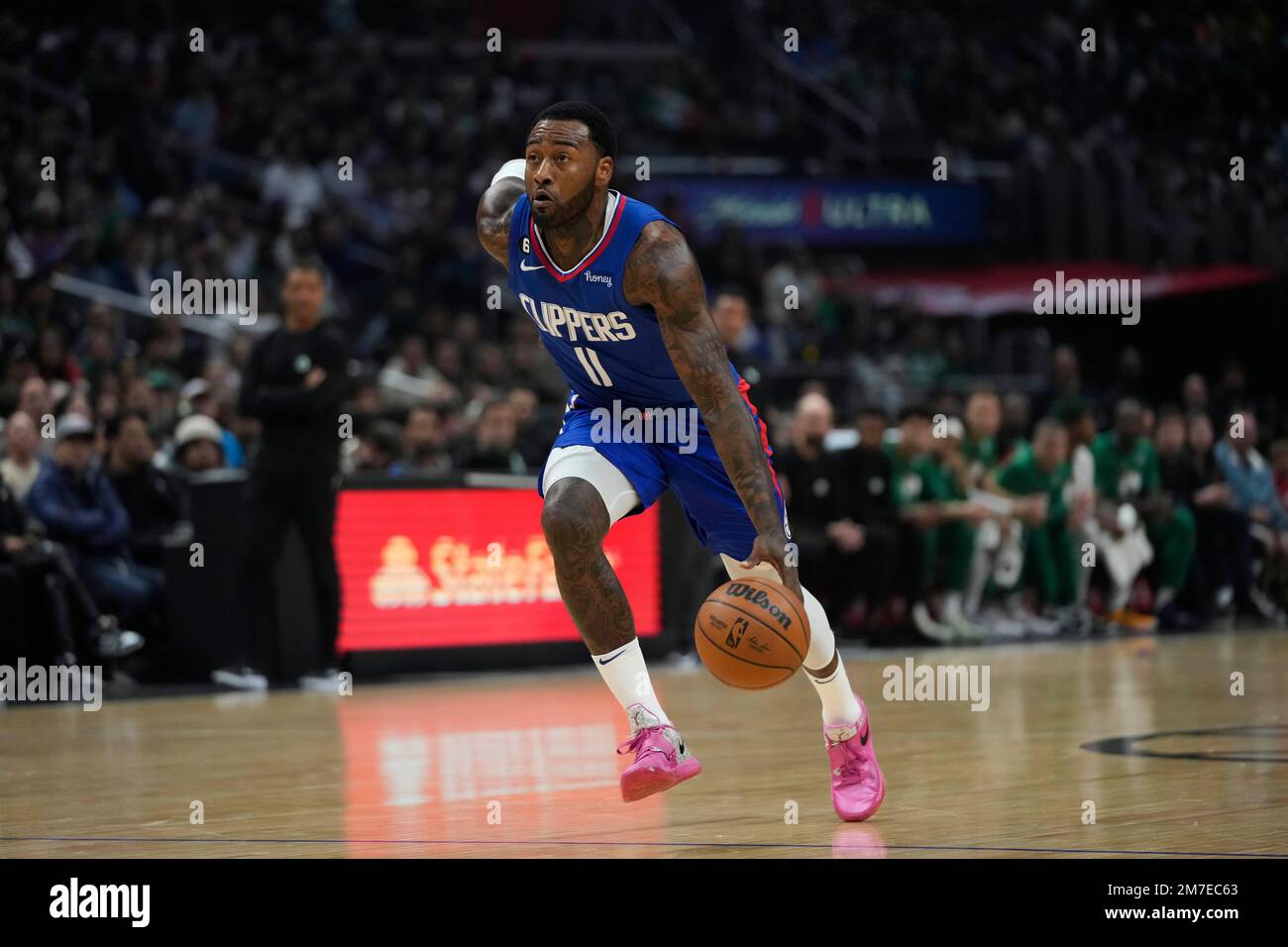 Los Angeles Clippers' John Wall dribbles during first half of an NBA ...