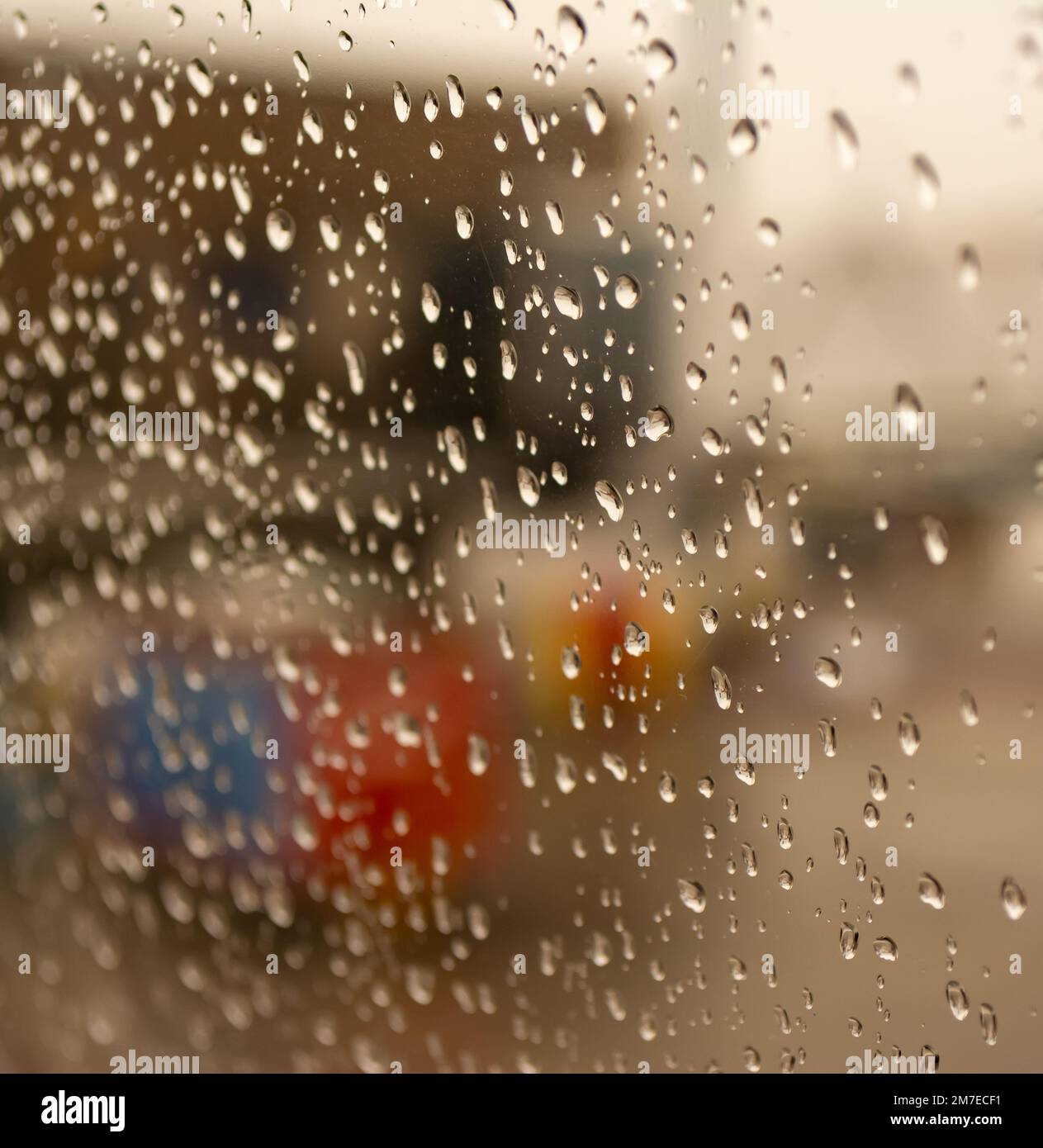 looking out a window as the rain is falling down Stock Photo - Alamy