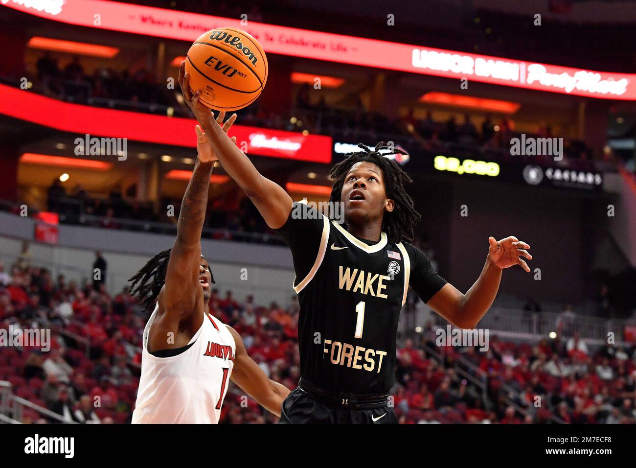 Wake Forest guard Tyree Appleby (1) goes in for a layup past Louisville ...