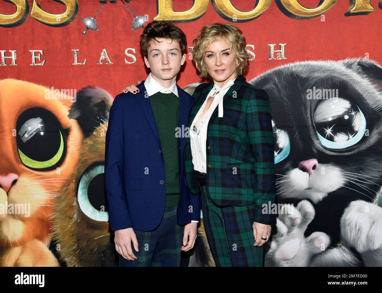 Amy Carlson, right, and son Nigel Butler attend the premiere of "Puss ...